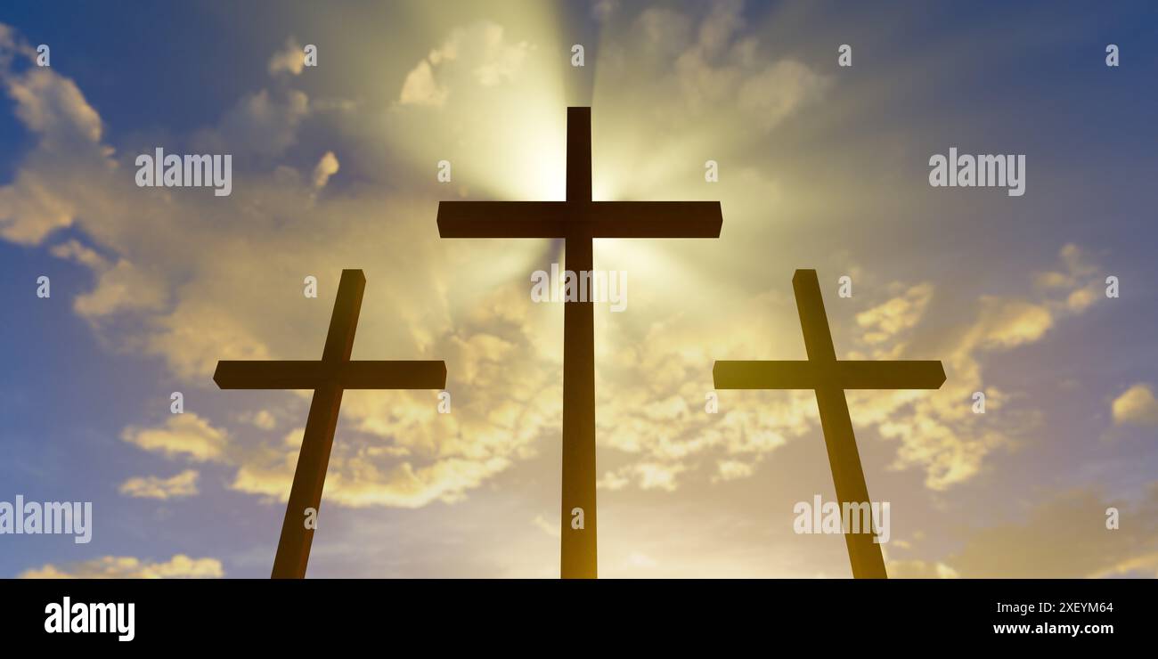 Three Jesus Christ christian crucifixes or crosses backlit from sunset ...