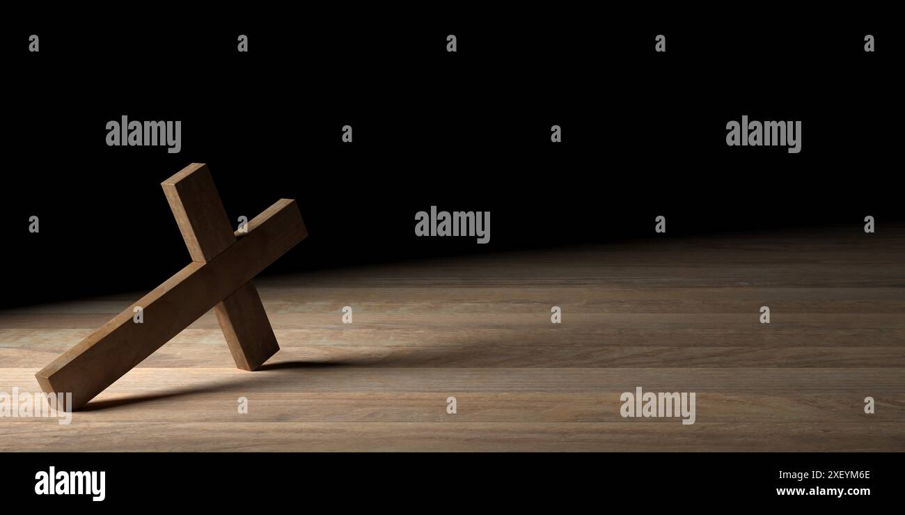Wooden Jesus Christ christian crucifix or cross leaning on wood table ...