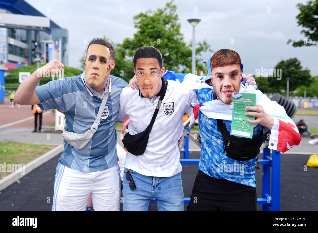 England fans wearing facemasks of Phil Foden, Jude Bellingham and Cole ...