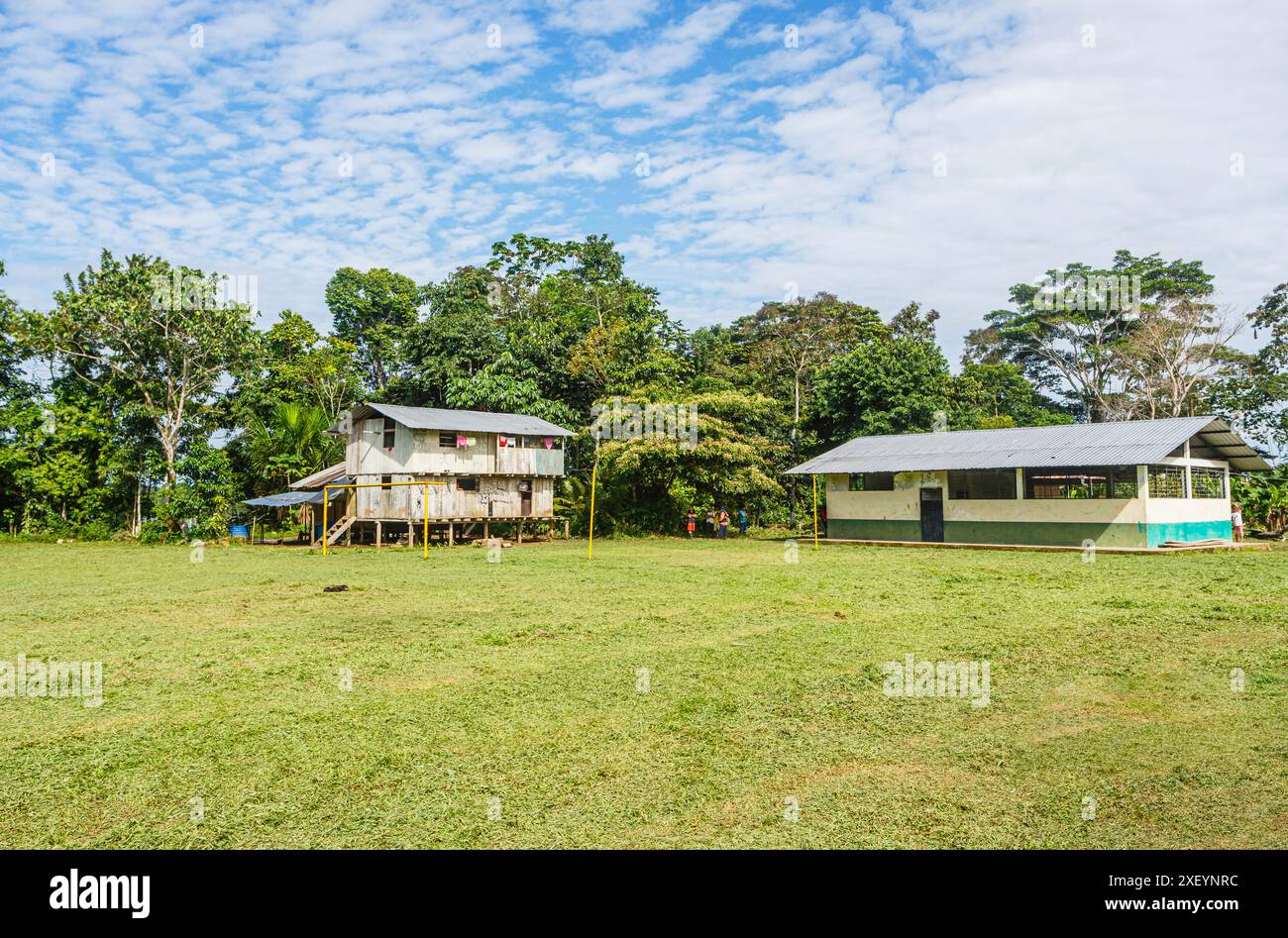 Typical wooden communal residential building on stilts in the remote ...