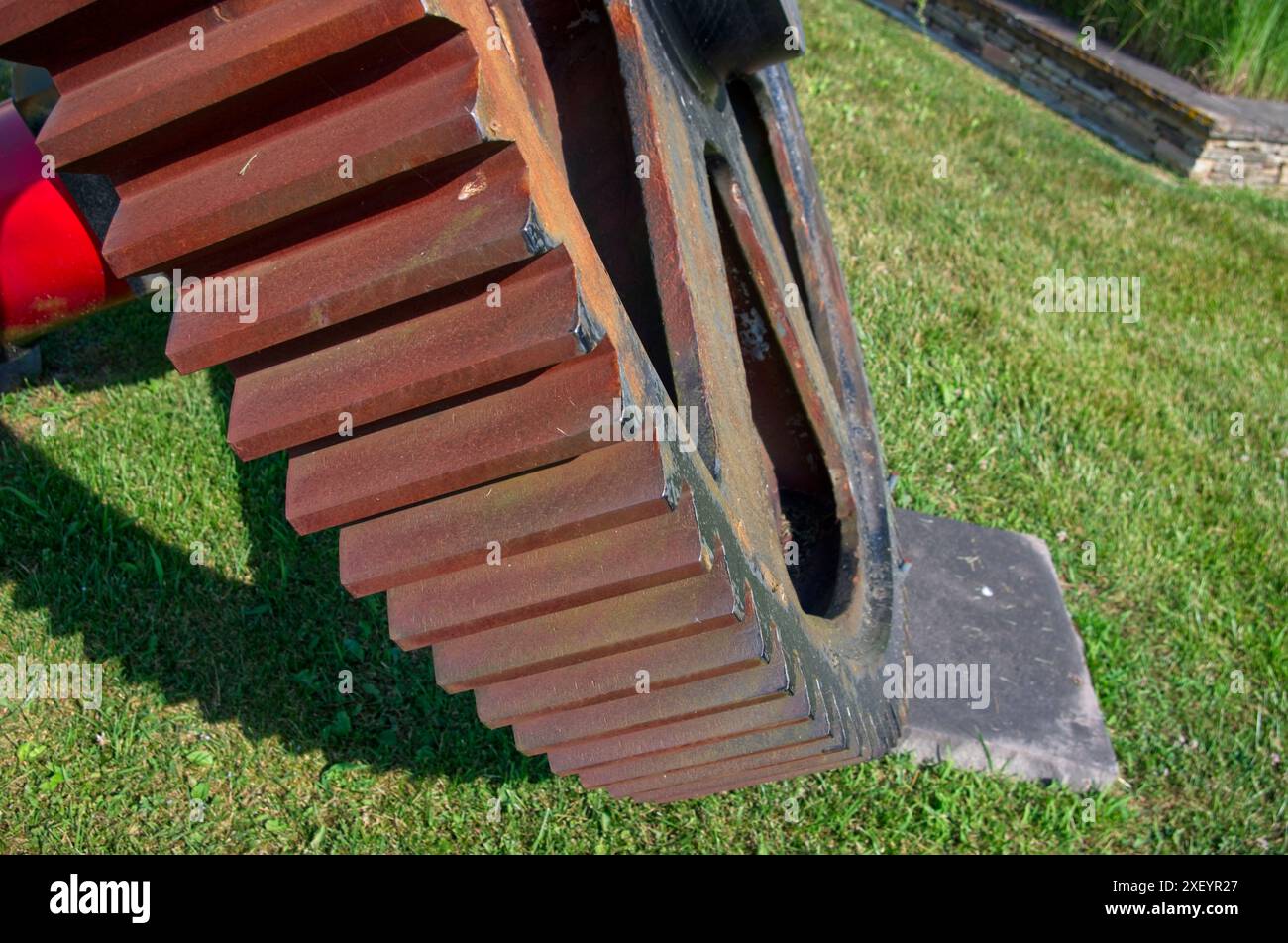 Close up of edge of large steel gear wheel Stock Photo - Alamy
