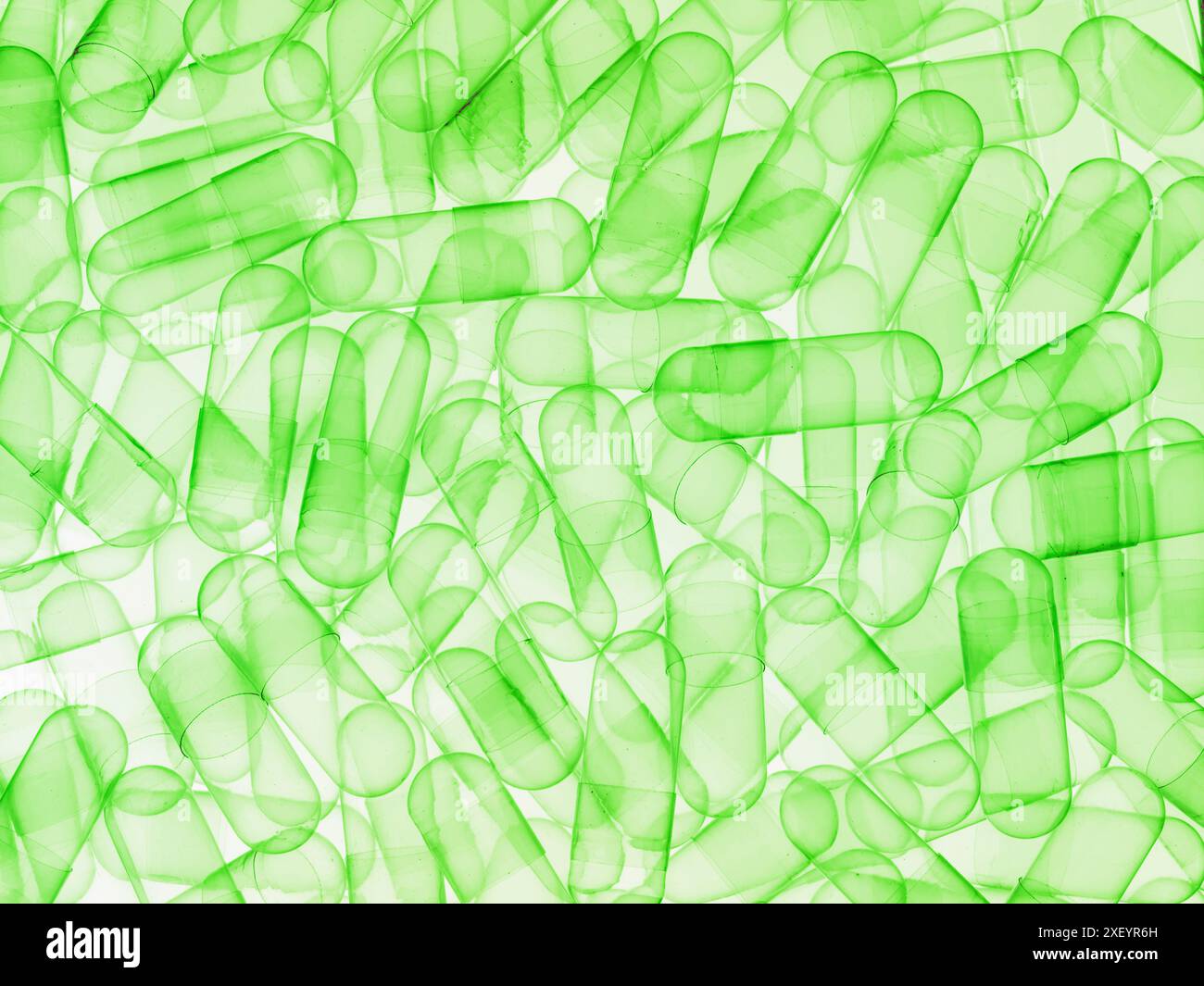Empty clear green capsules Stock Photo - Alamy