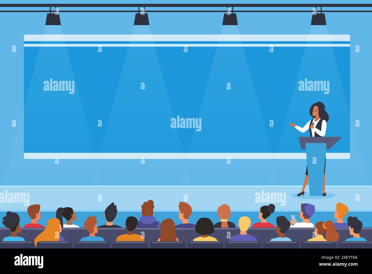 A speaker delivering a presentation at a conference, standing at a ...