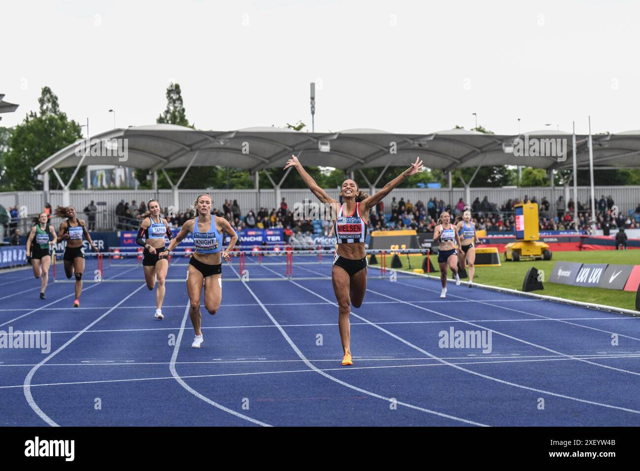 Lina Nielsen wins the women’s 400m hurdles final during the Microplus ...
