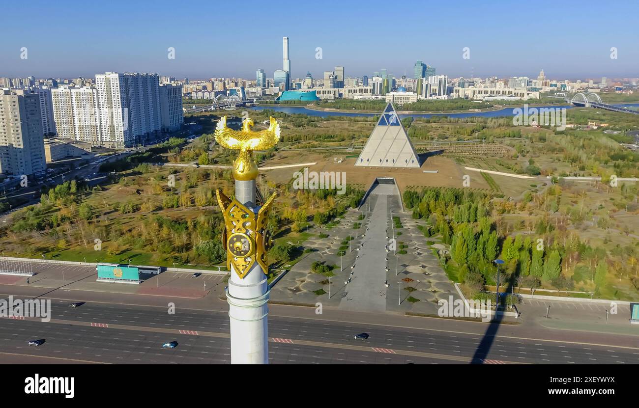 The top of Kazakh Eli monument with Palace of Peace and Reconciliation ...