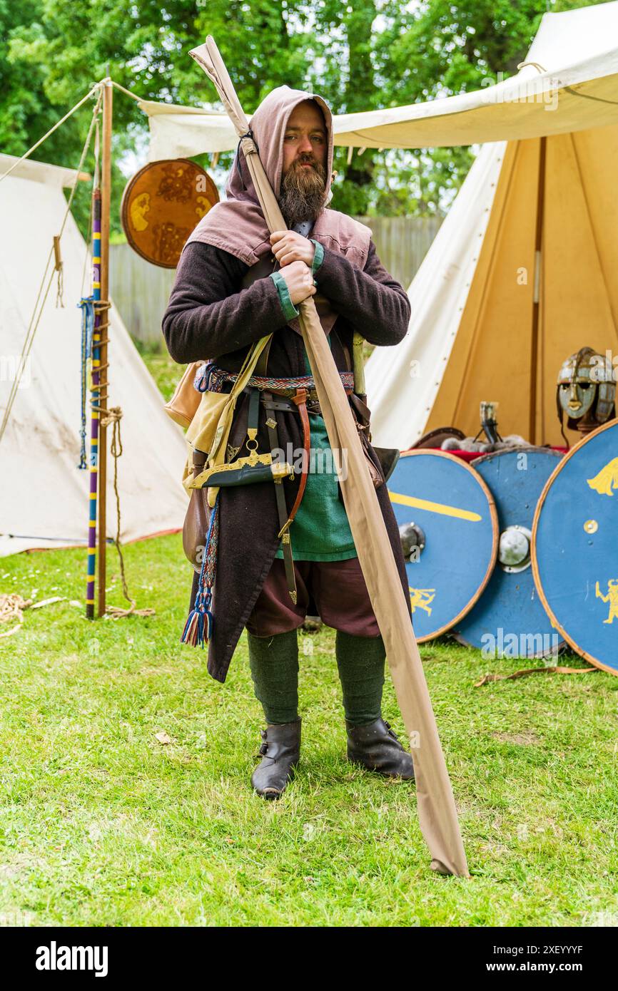 Medieval longbow-man standing facing viewer with his long bow in a ...