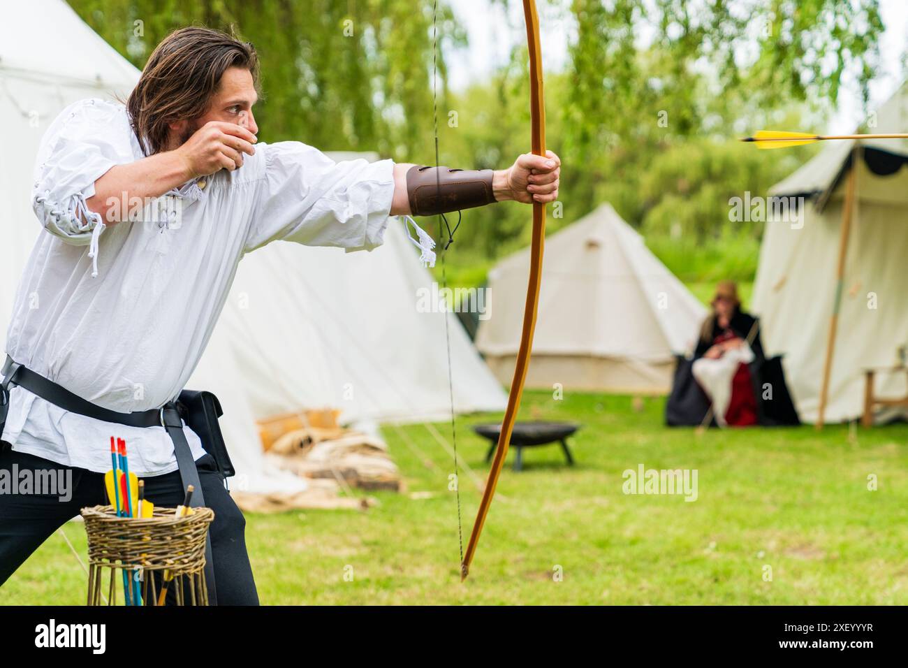Firing a bow hi-res stock photography and images - Alamy