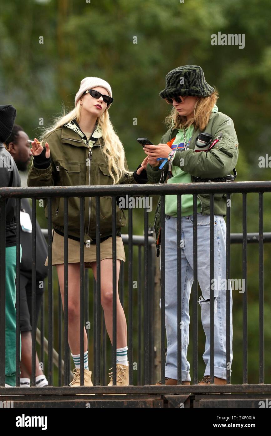 Anya Taylor-Joy, left, and Cara Delevingne before the Shania Twain ...