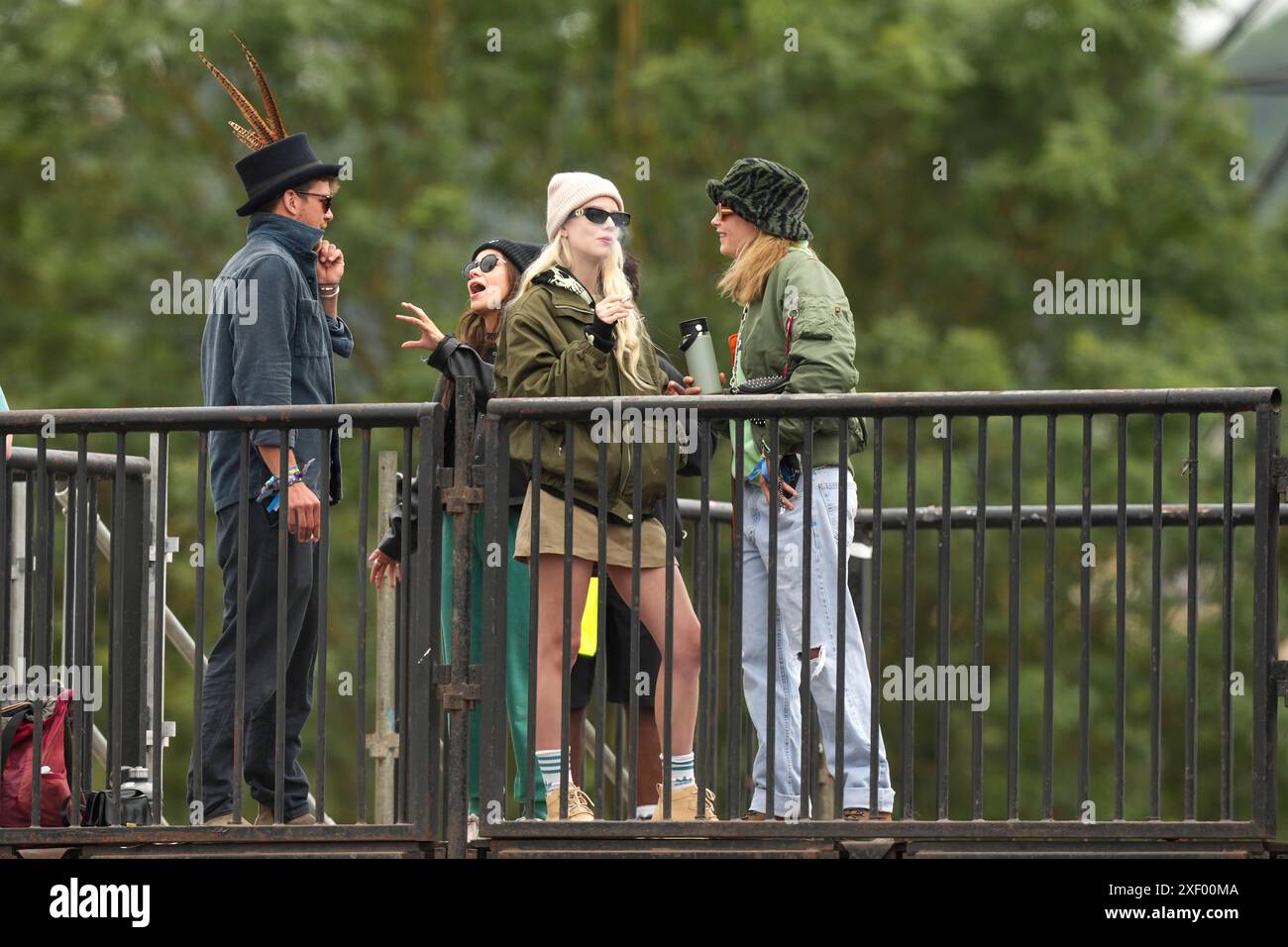 Anya Taylor-Joy, second from right, and Cara Delevingne before the Shania Twain performance at ...