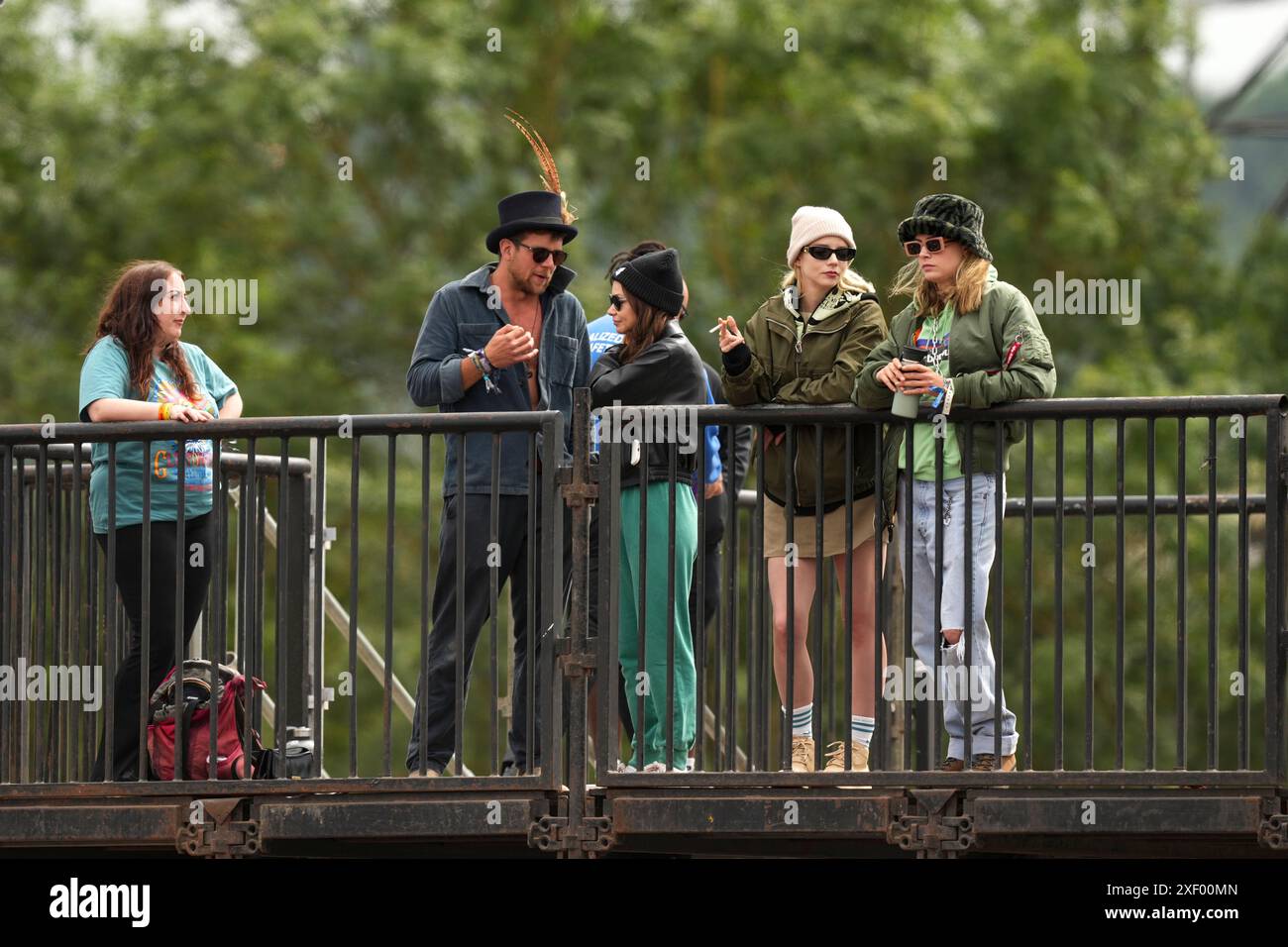 Anya Taylor-Joy, second from right, and Cara Delevingne before the Shania Twain performance at ...