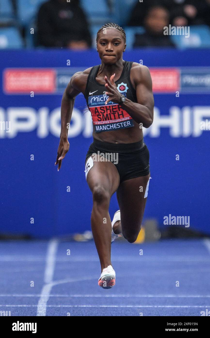 Dina Asher-Smith leads the women’s 200m final during the Microplus UK ...