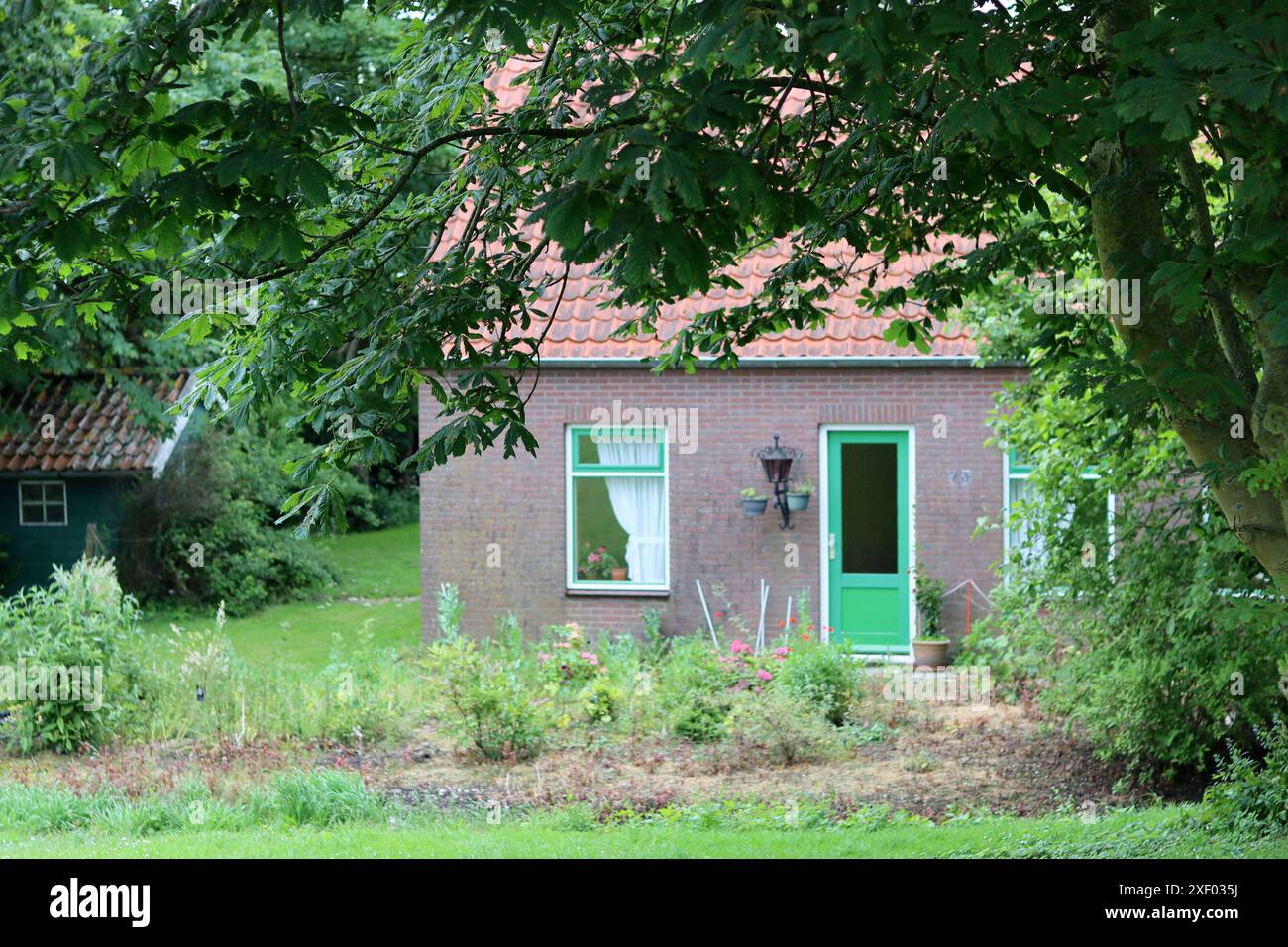 Old brick house with re tiled roof in the countryside of the ...