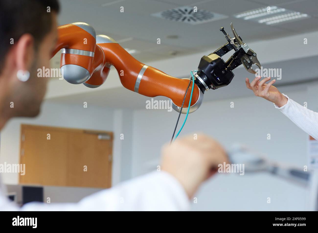 Human robotics cooperation male hi-res stock photography and images - Alamy