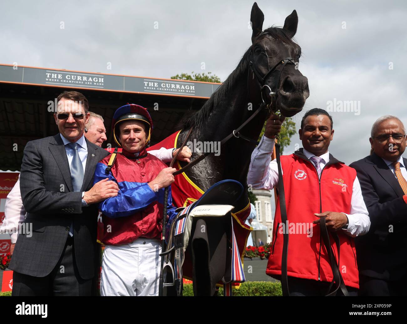 Aidan O'Brien and Ryan Moore after winning the Dubai Duty Free Irish ...