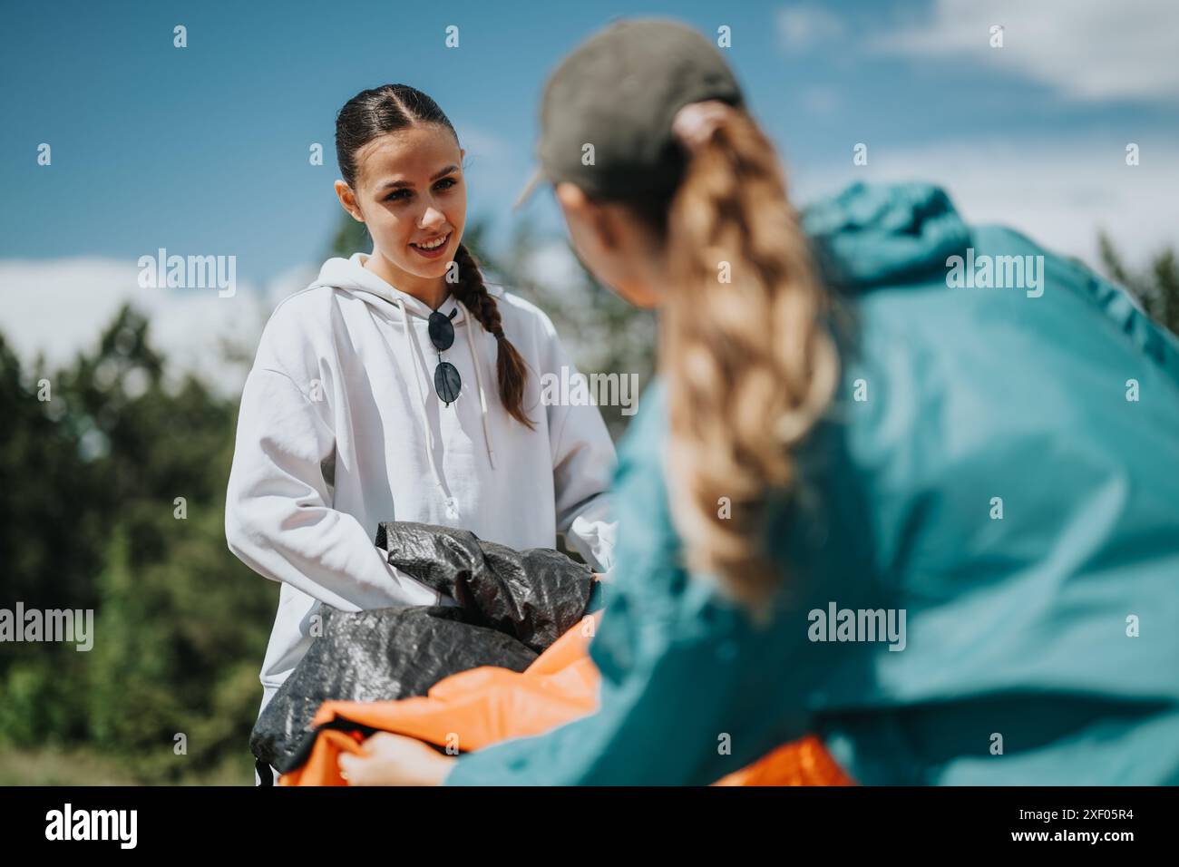 Two women cleaning team hi-res stock photography and images - Alamy