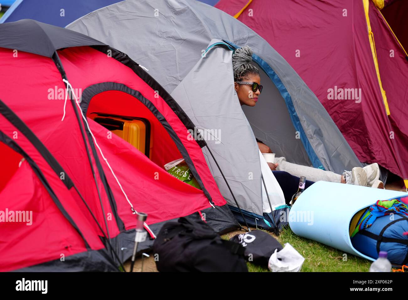 A spectator in the overnight queue ahead of the Wimbledon championships ...