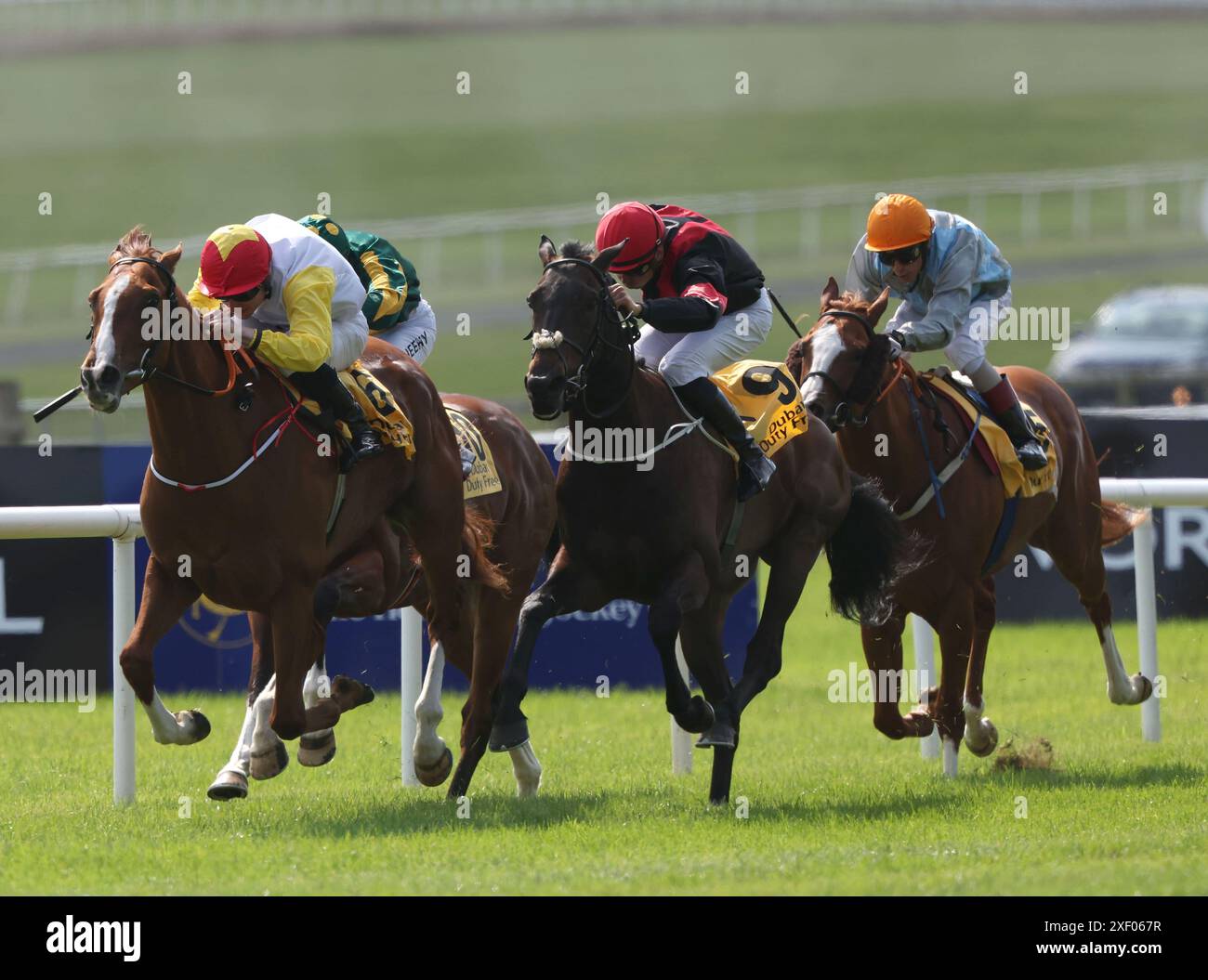 Booyea ridden by Gavin Ryan on their way to winning the Dubai Duty Free ...