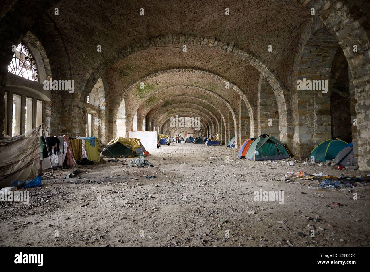People seek shelter inside Trieste silo. Credit: M.BARIONA/Alamy Stock ...