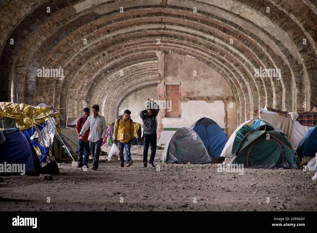 People seek shelter inside Trieste silo. Credit: M.BARIONA/Alamy Stock ...