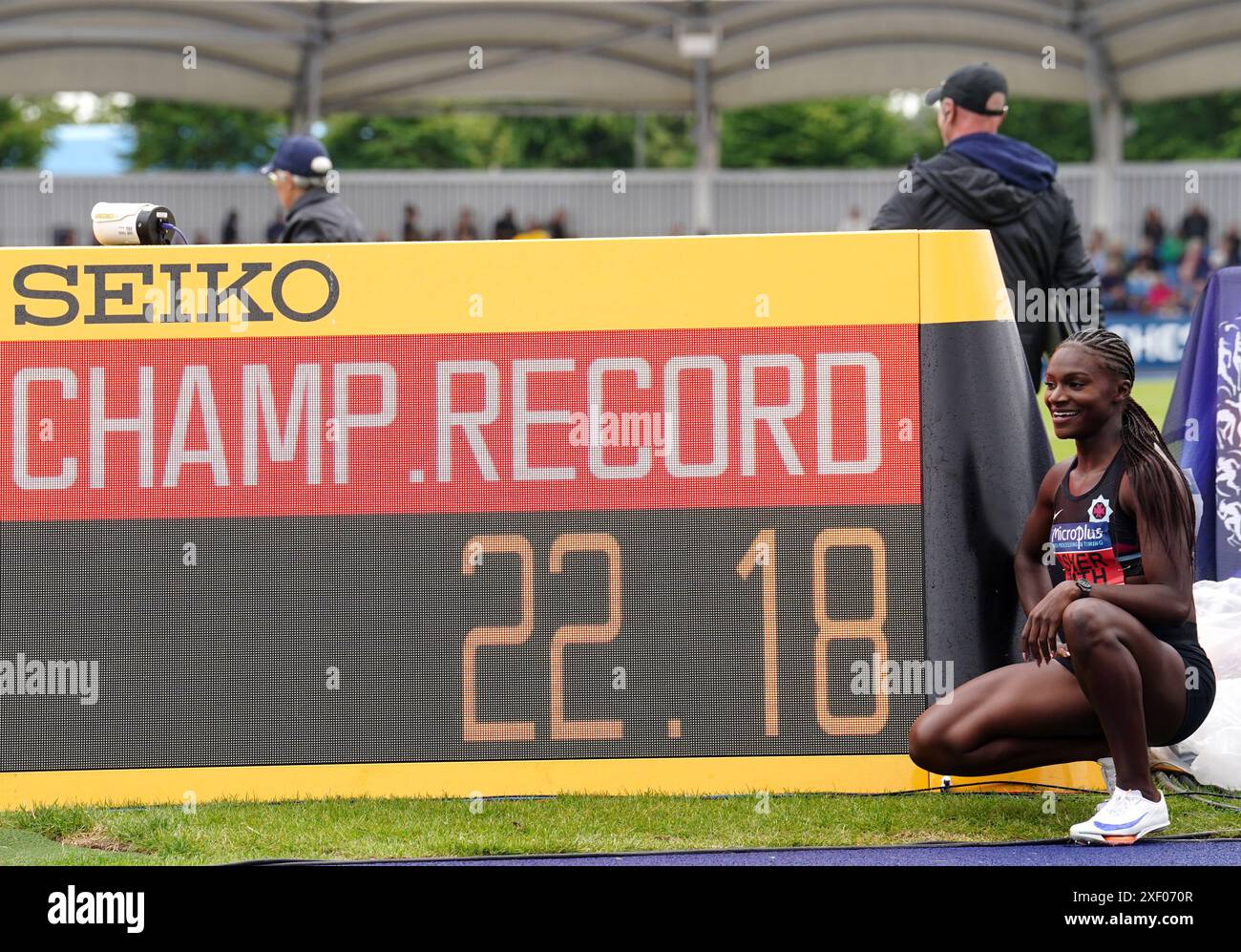 Dina Asher-Smith celebrates winning and setting a championship record ...