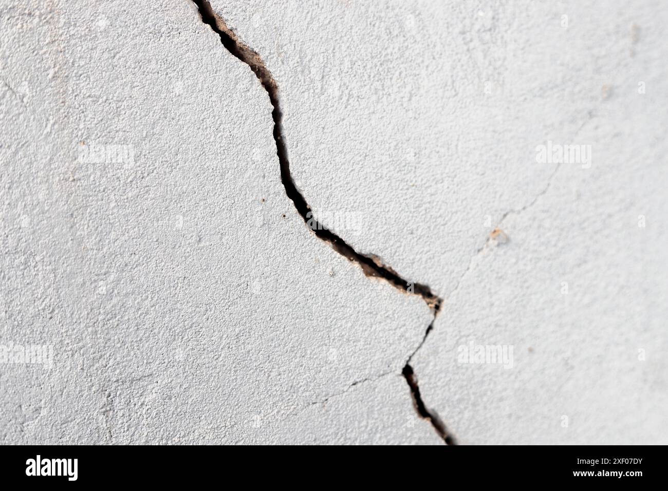 In this photo illustration, a crack in the wall. Cracks can be caused ...