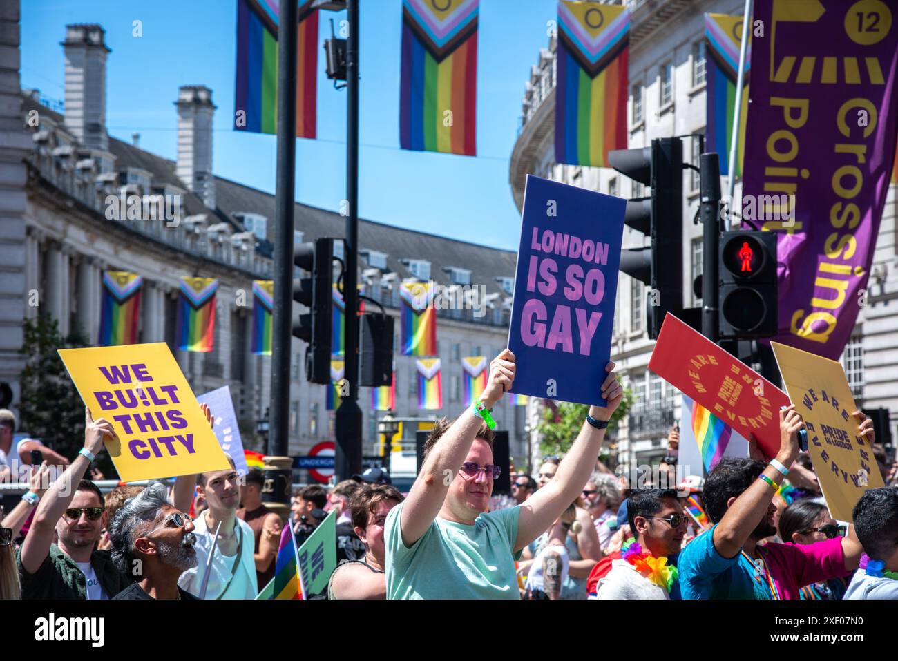 London, UK. 29th June, 2024. Party revellers hold placards during the ...