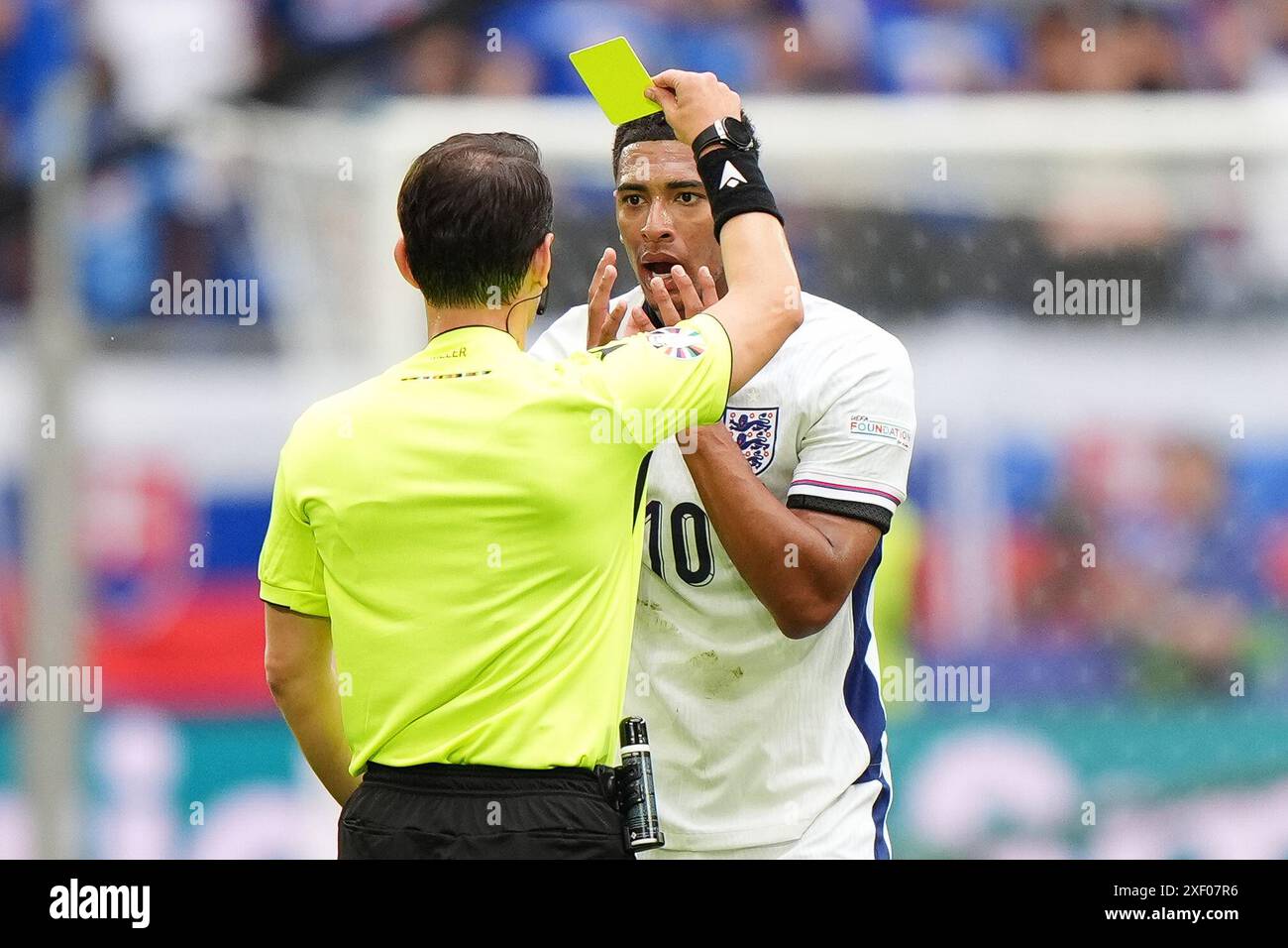 England's Jude Bellingham reacts as he is shown a yellow card by match ...