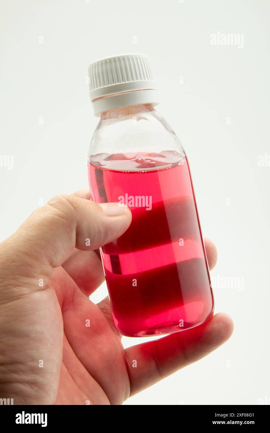 Lab sample bottles with red sample hi-res stock photography and images ...