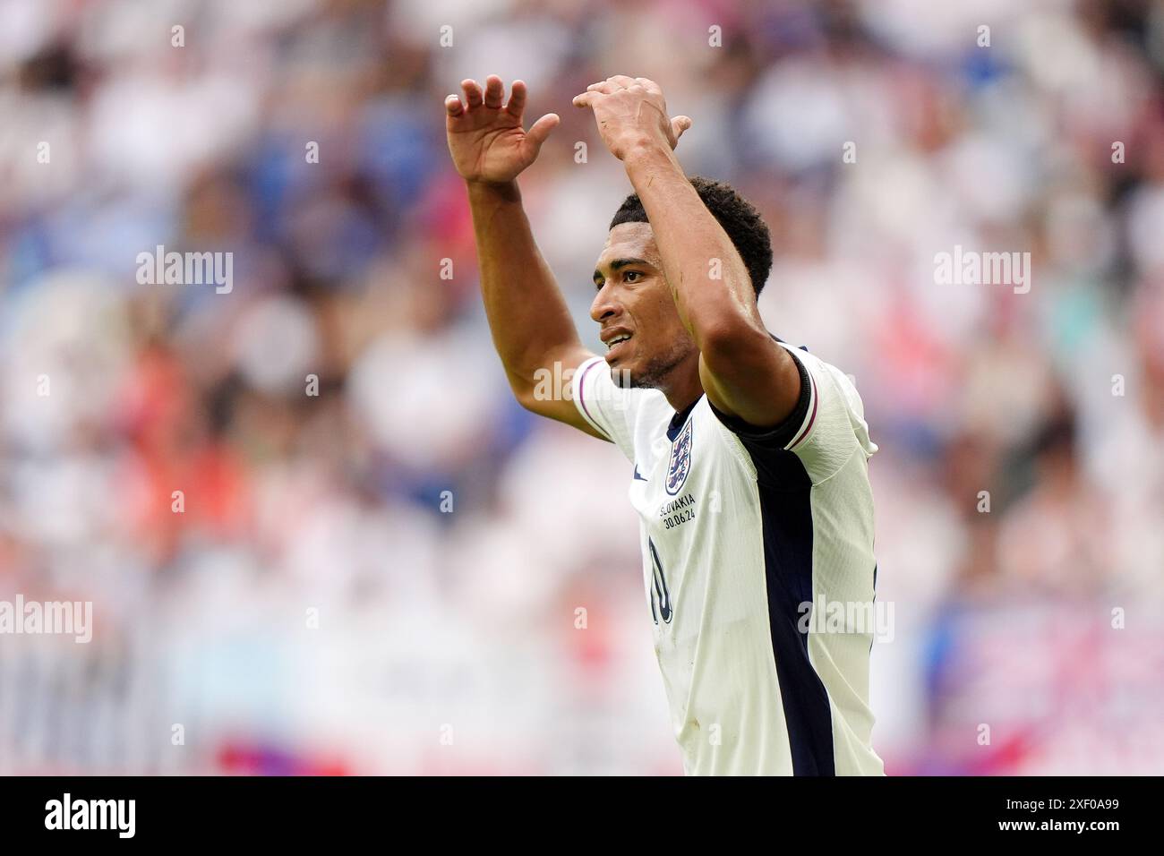 England's Jude Bellingham gestures towards the fans during the UEFA ...