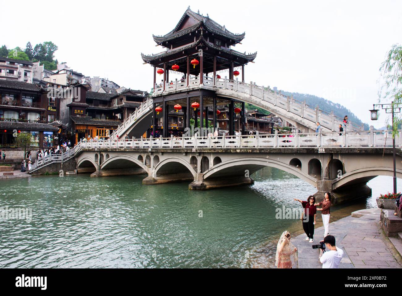 Tuojiang river and Historic building house of wind and rain and ...