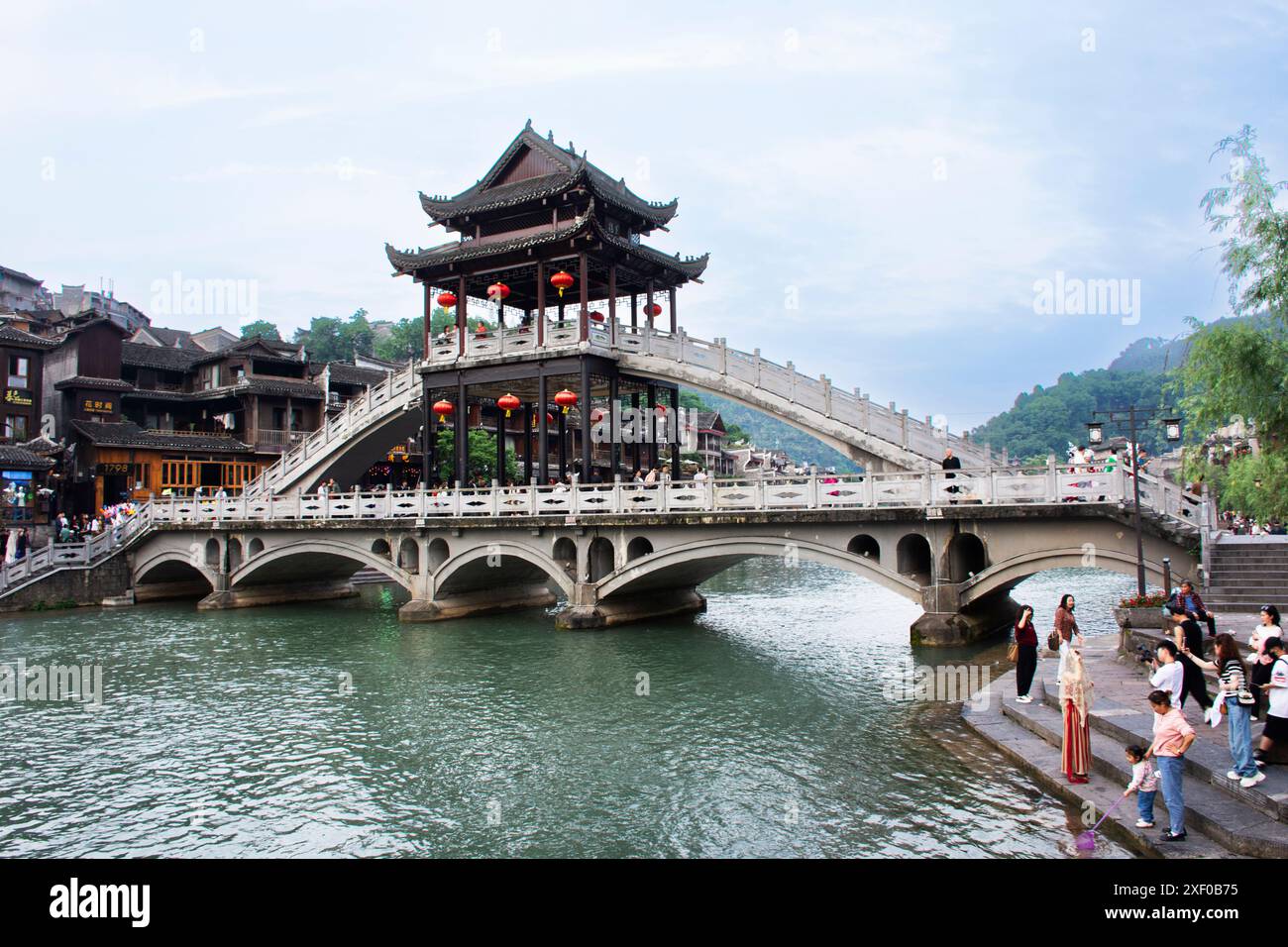 Tuojiang river and Historic building house of wind and rain and ...