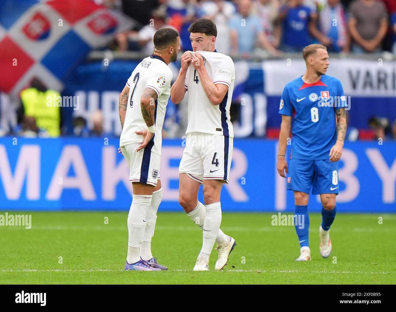 England's Kyle Walker (left) and Declan Rice react after Slovakia's ...