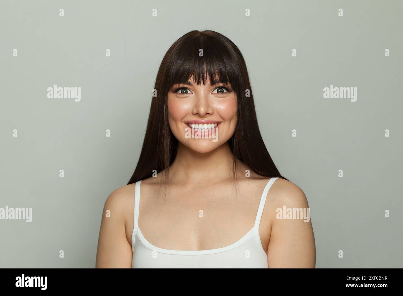 Happy healthy female model with clean skin, make-up and perfect ...