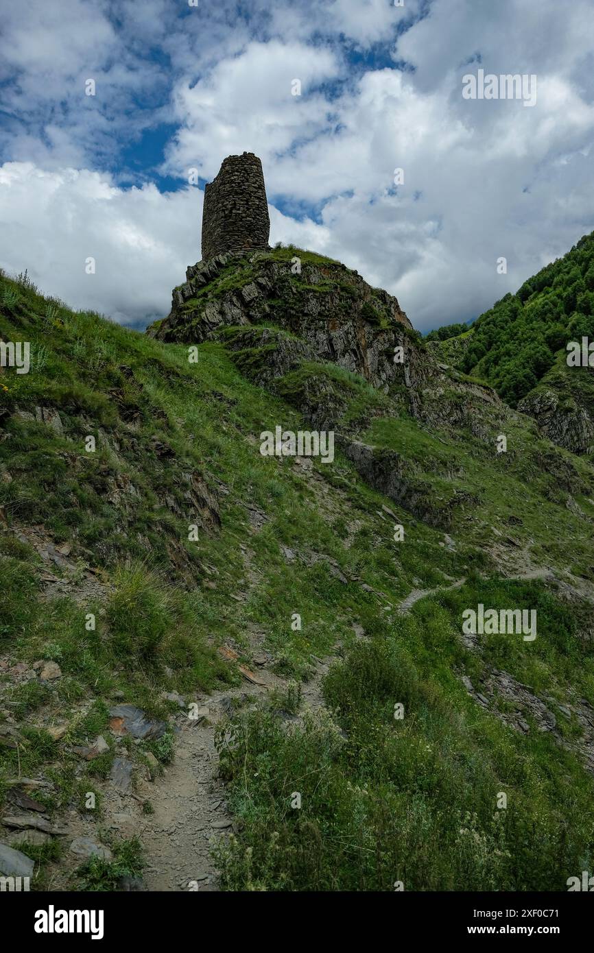 Stepantsminda, Georgia - June 30, 2024: Landscape with the ruins of the ...