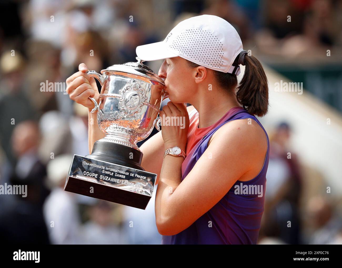 French Open 2024 Champion Iga Swiatek of Poland is holding the trophy ...