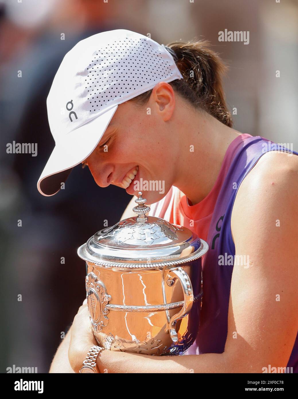 French Open 2024 Champion Iga Swiatek of Poland is holding the trophy ...