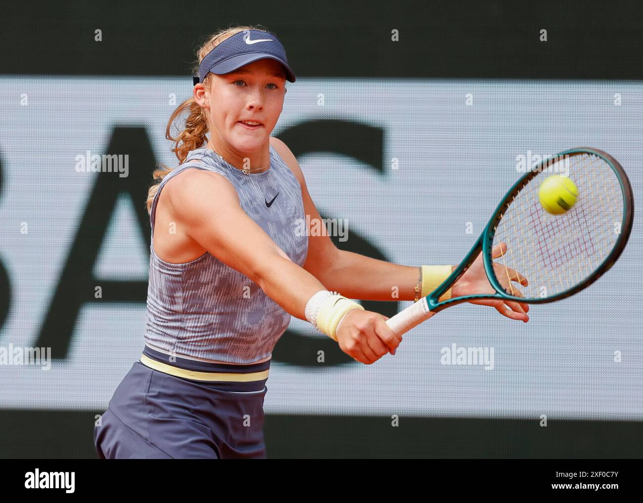Russian tennis player Mirra Andreeva in action at the French Open 2024 ...