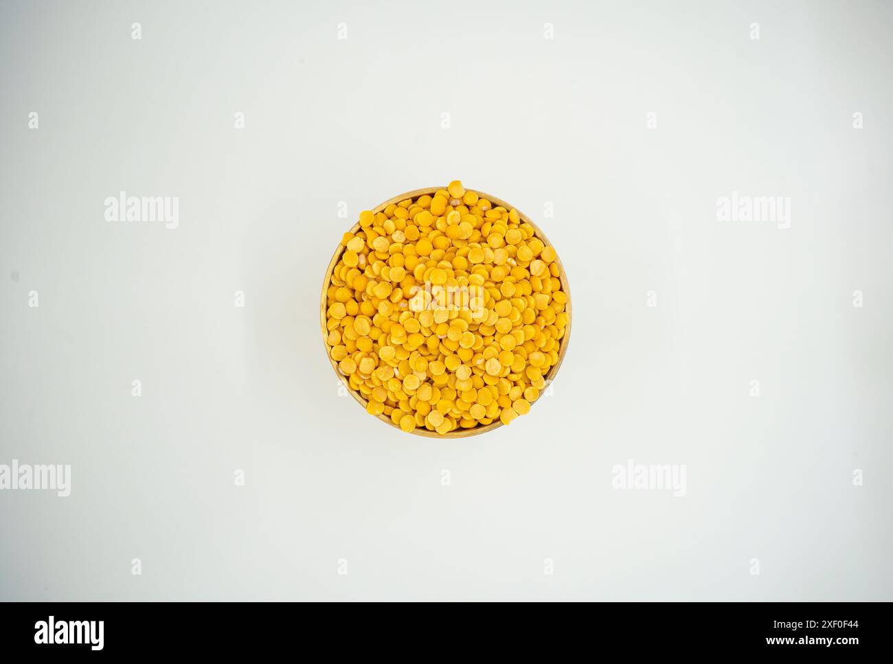 A Bowl of urad rahar dal Pigeon pea lentil beans isolated in a white ...