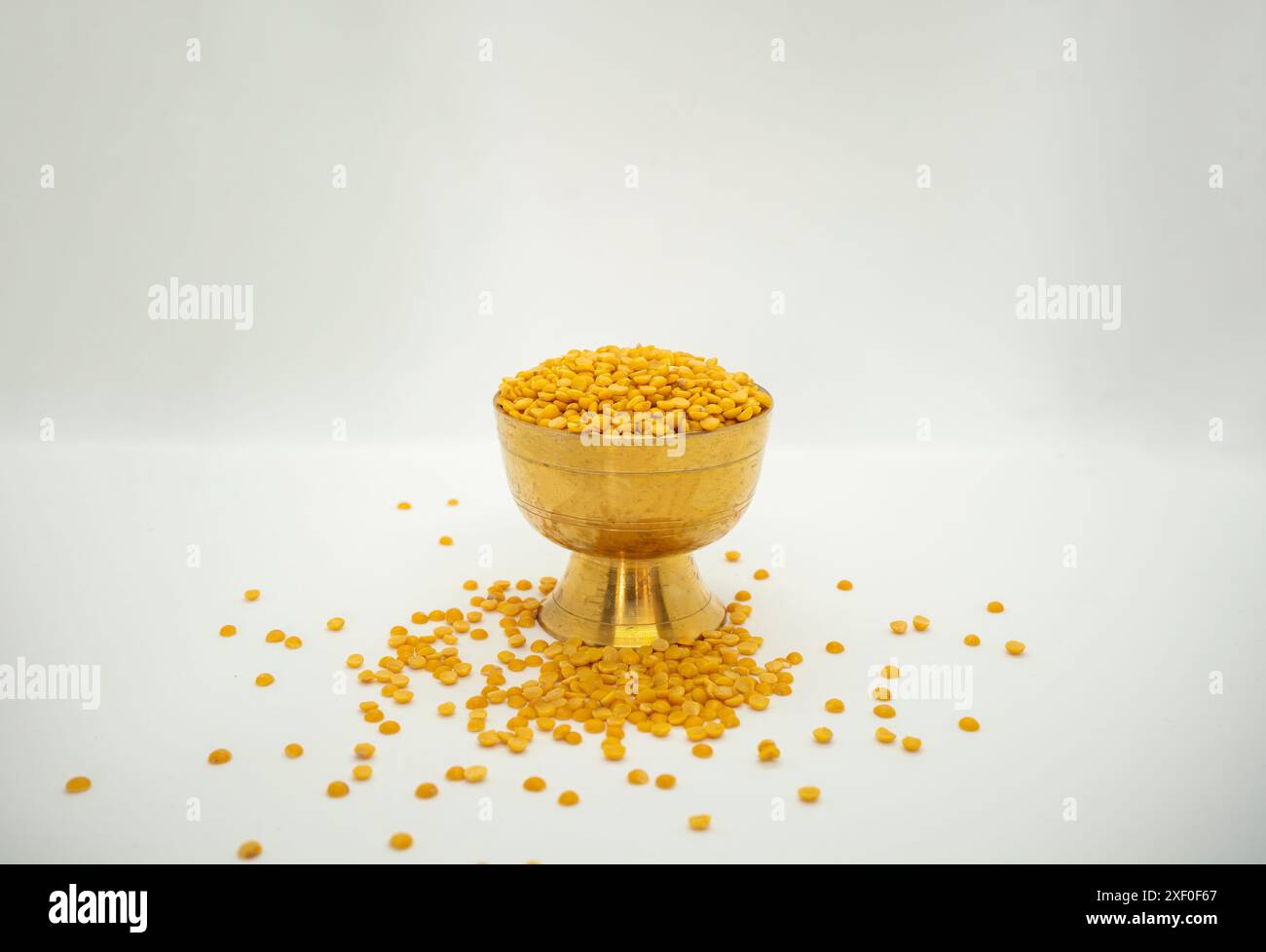 A Bowl of urad rahar dal Pigeon pea lentil beans isolated in a white ...