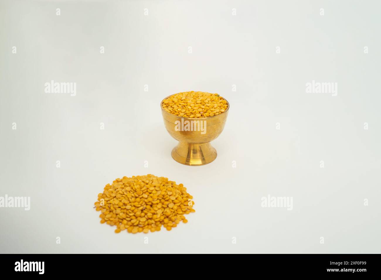 A Bowl of urad rahar dal Pigeon pea lentil beans isolated in a white ...