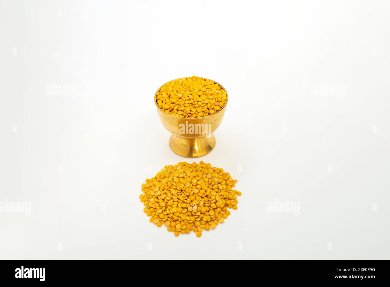 A Bowl of urad rahar dal Pigeon pea lentil beans isolated in a white ...
