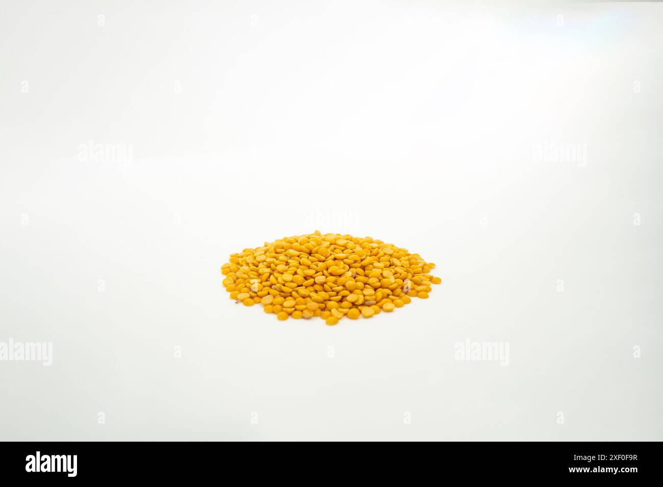A Bowl of urad rahar dal Pigeon pea lentil beans isolated in a white ...