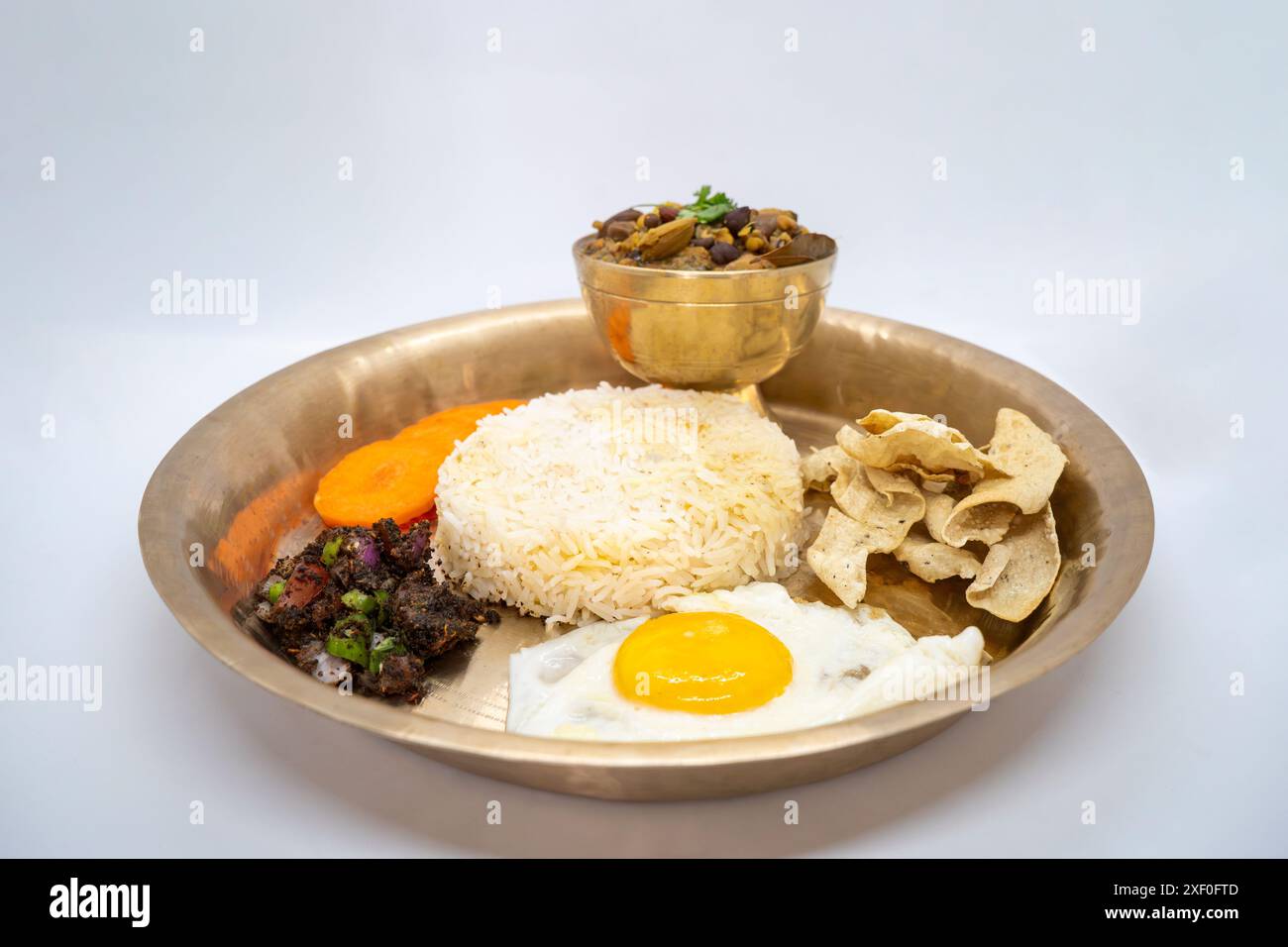 Nepali Thali Set with Kwati Mix Bean Soup, Rice, Omlette in a plate for ...