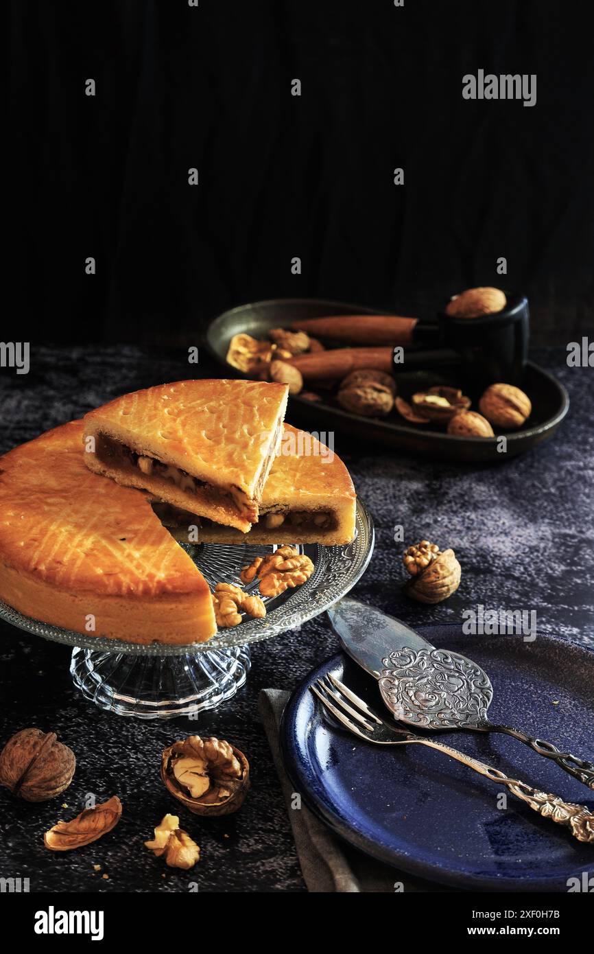 Engadine Walnuts Torte or Buendner Nusstorte on glass plate, a Swiss ...