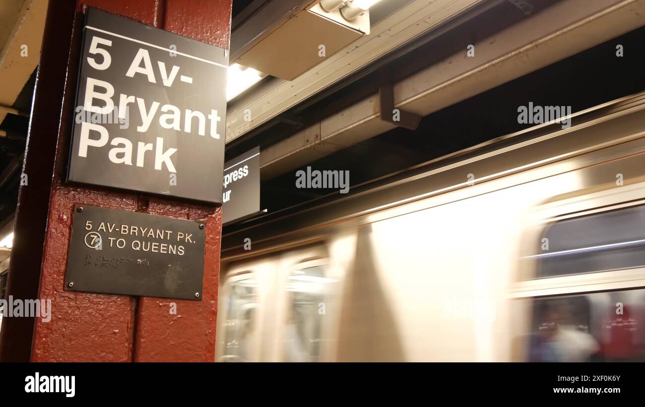 New York City subway station, underground metropolitan platform sign ...