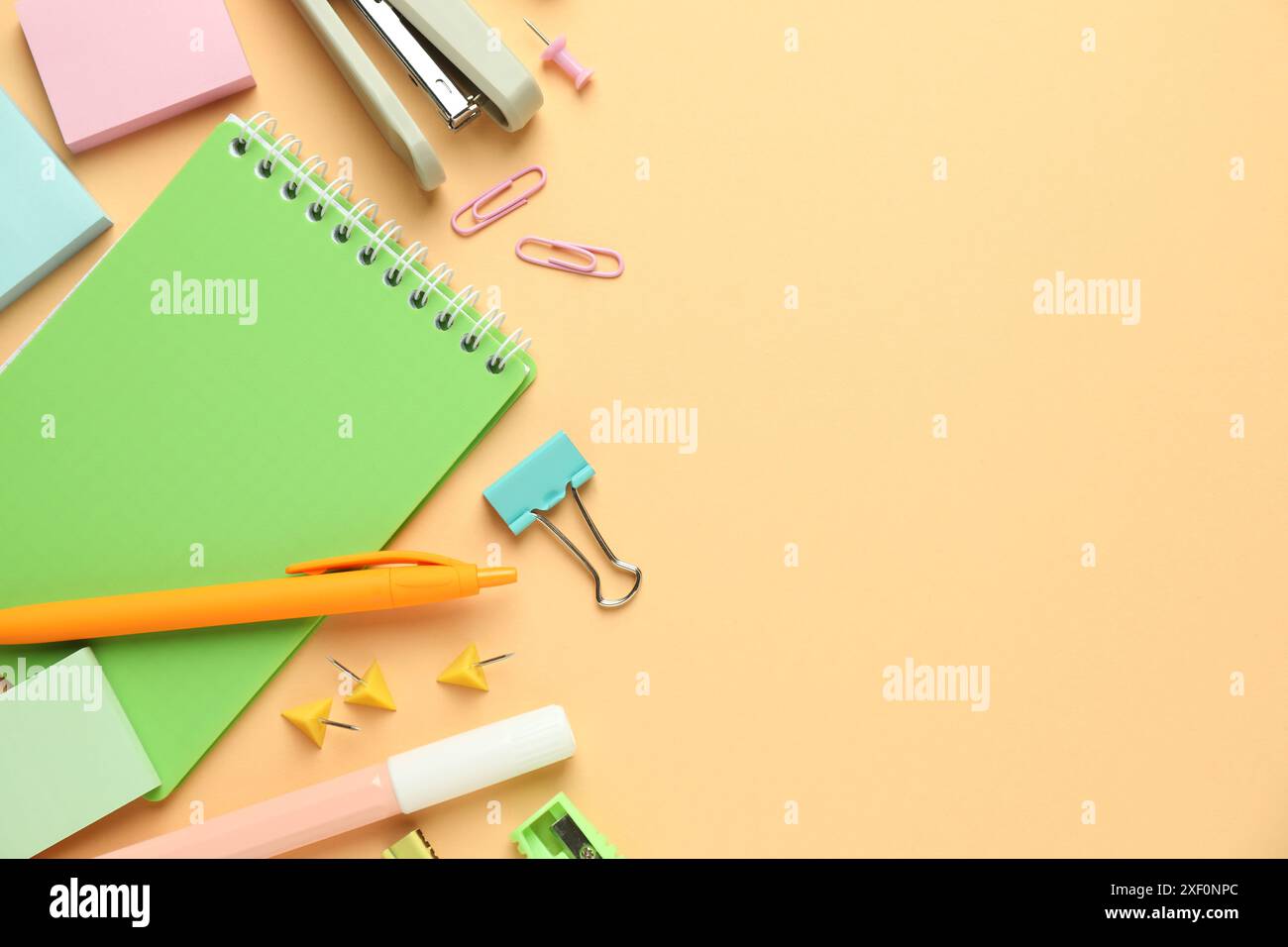 Flat lay composition with notebook, stapler and different stationery on ...
