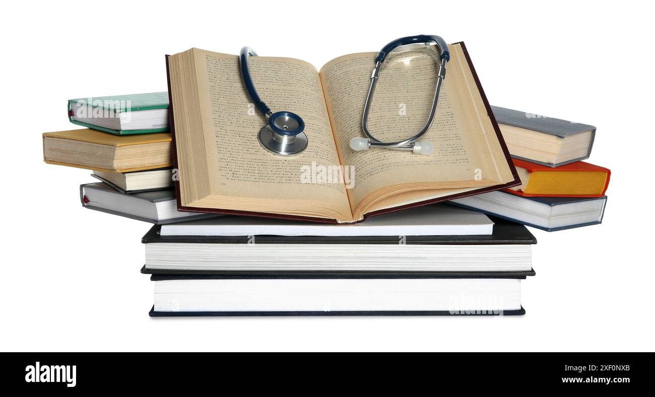 Stethoscope and stack of books isolated on white Stock Photo - Alamy