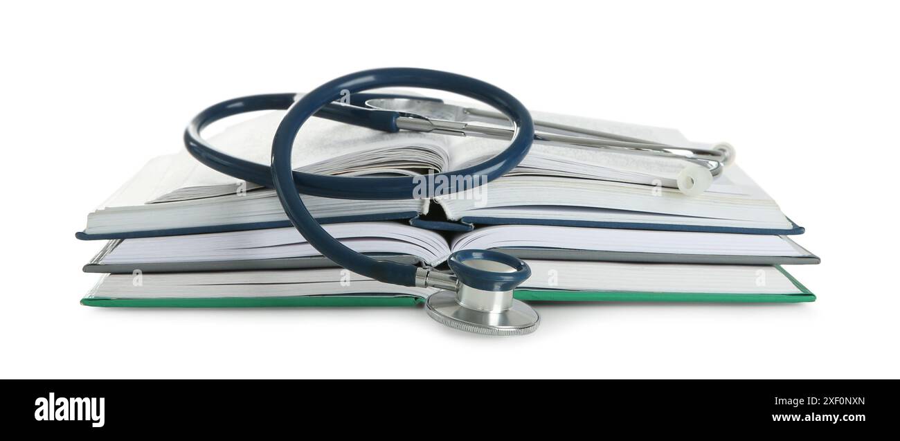 One new medical stethoscope and books isolated on white Stock Photo - Alamy