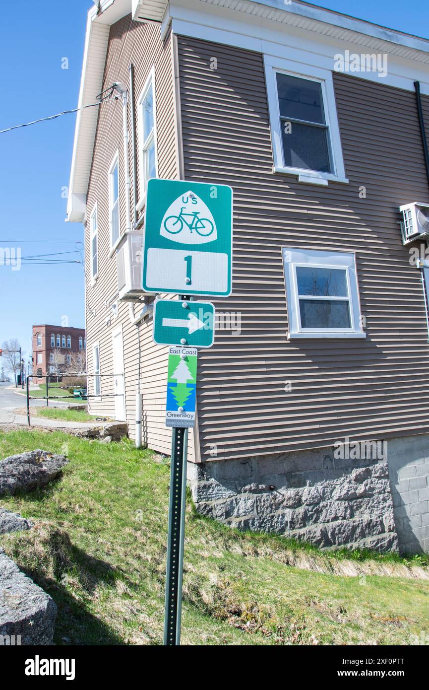 Bike trail and east coast greenway signs at the riverfront walkway in ...