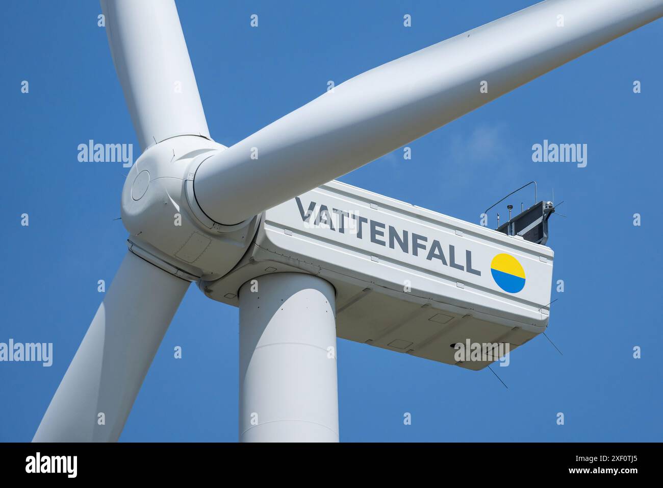 Vattenfall wind turbine against blue sky Stock Photo - Alamy
